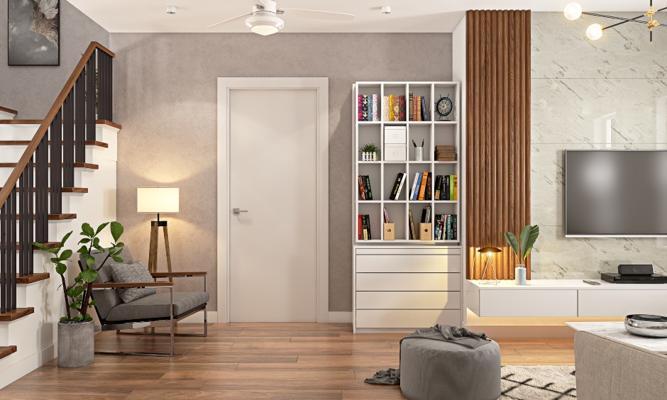 An All White Living Room With Wooden Flooring - DesignCafe