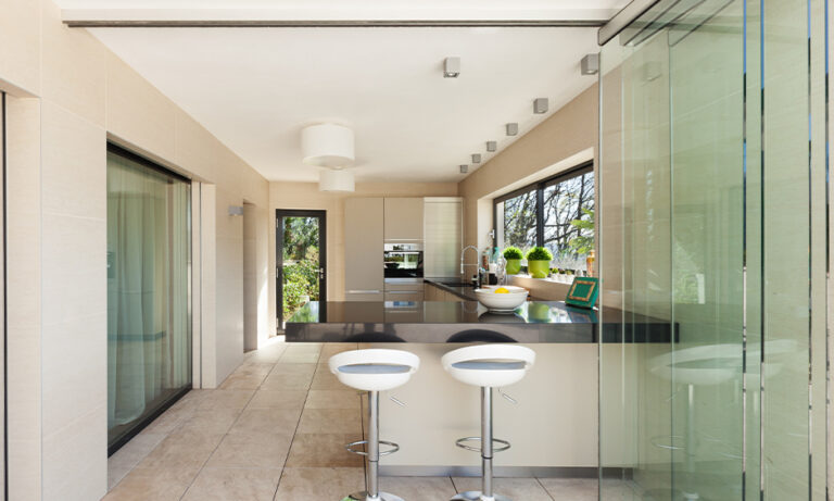 The Benefits of Installing Kitchen Sliding Doors | DesignCafe